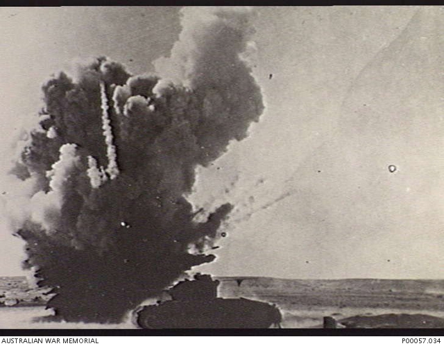 SIDI BARRANI, EGYPT. 1941. BILLOWS OF SMOKE RISING BEHIND A TANK AS A ...