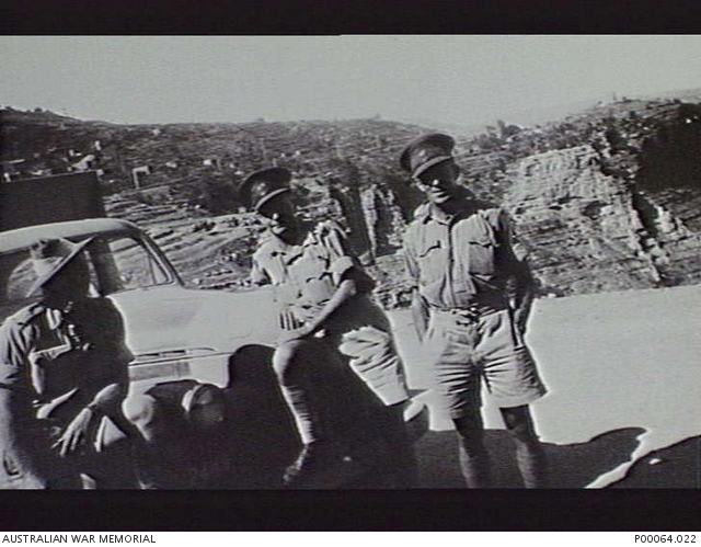 SYRIA. C.1941. STANDING IN FRONT OF A CAR, LEFT TO RIGHT: REG PRITCHARD ...