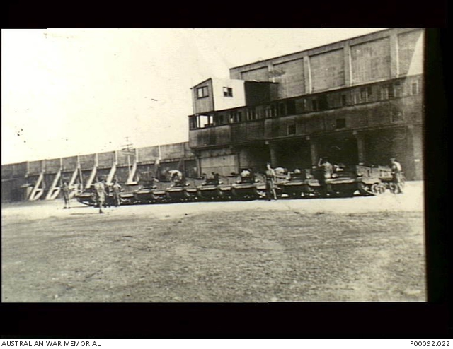 DARWIN, NT. 1940. CHECKING MAINTENANCE ON BREN GUN CARRIERS BEFORE ...
