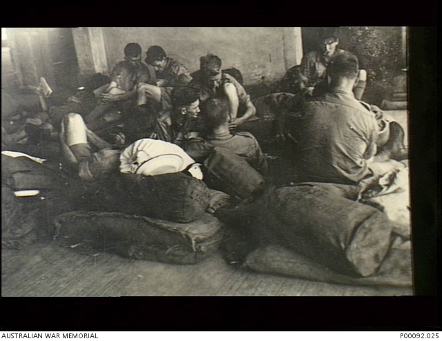 DARWIN, NT. 1940-08. A GAME OF POKER IN THE QUARTERS OF 17 PLATOON, 2 ...