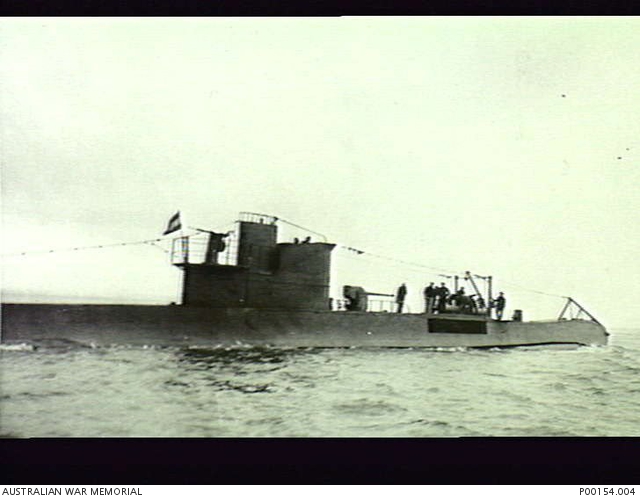 AT SEA. C.1943. CREW ON FOREDECK OF HER NETHERLANDS MAJESTY'S SUBMARINE ...