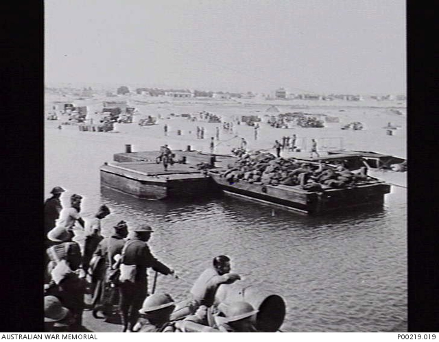 MERSA MATRUH HARBOUR, EGYPT, C. 1940. VIEW OF THE WHARF SHOWING TROOPS ...