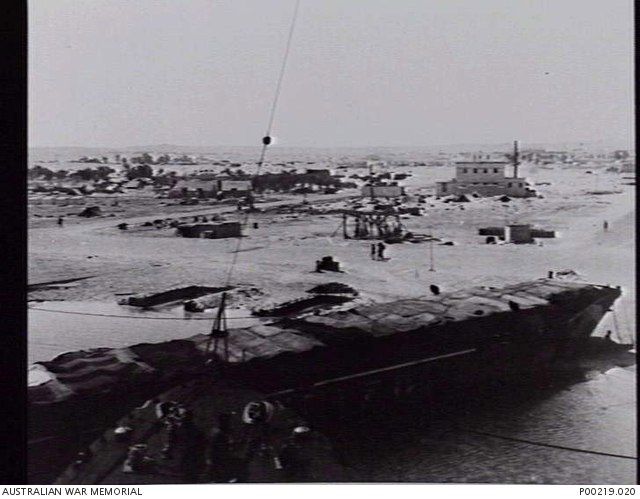 MERSA MATRUH HARBOUR, EGYPT, C. 1940. VIEW OF THE WHARF SHOWING A ...