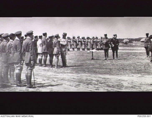 CAPTAIN EDWARD TELFORD SIMPSON BEING PRESENTED WITH THE CROIX DE GUERRE ...