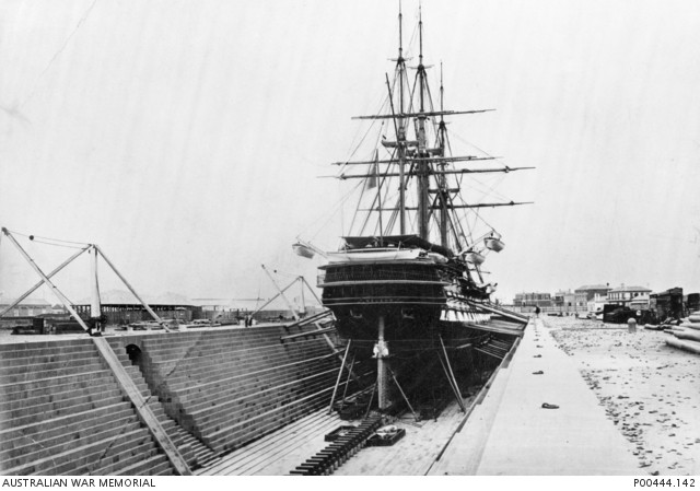 WILLIAMSTOWN 1874-03. HMVS NELSON IN THE ALFRED GRAVING DOCK. WORKMEN ...
