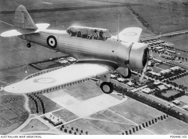 POINT COOK, VIC. C 1938. NORTH AMERICAN NA-16 AIRCRAFT IN FLIGHT OVER ...