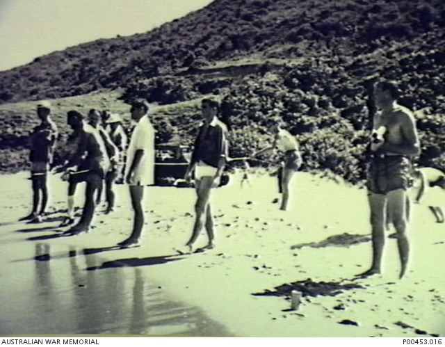 FRONT BEACH, VUNG TAU, VIETNAM, 1965. MEMBERS OF THE RAAF USING A SURF ...