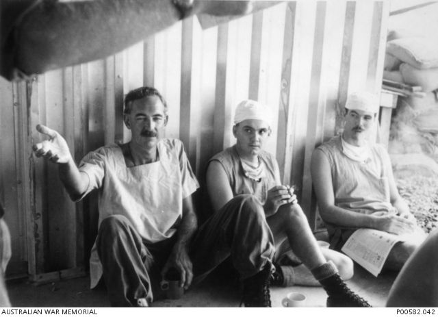VIETNAM, 1967. WEARY SURGEON, COLONEL DONALD BEARD (LEFT), WITH ...