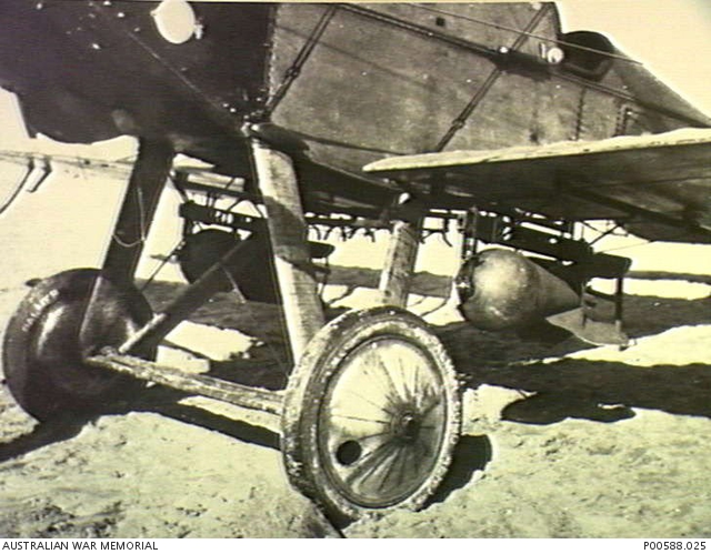 BOMB LOAD OF TWO 112LB BOMBS IN RACKS UNDER A BE2E AIRCRAFT ...
