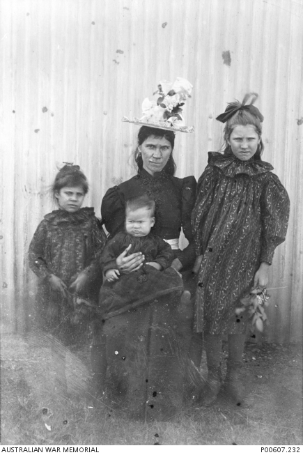 MAFEKING, SOUTH AFRICA, C. 1900. BOER WOMAN WITH HER THREE CHILDREN ...