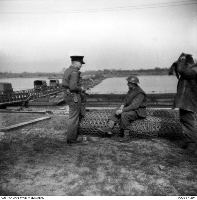 XANTEN, GERMANY, 1945-03. C. ISAAC, OFFICIAL PHOTOGRAPHER, TALKING WITH ...