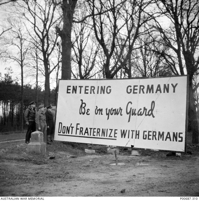 GERMAN BORDER, 1945-04. SIGNPOST VIEWED BY ALLIED TROOPS, "GERMAN ...
