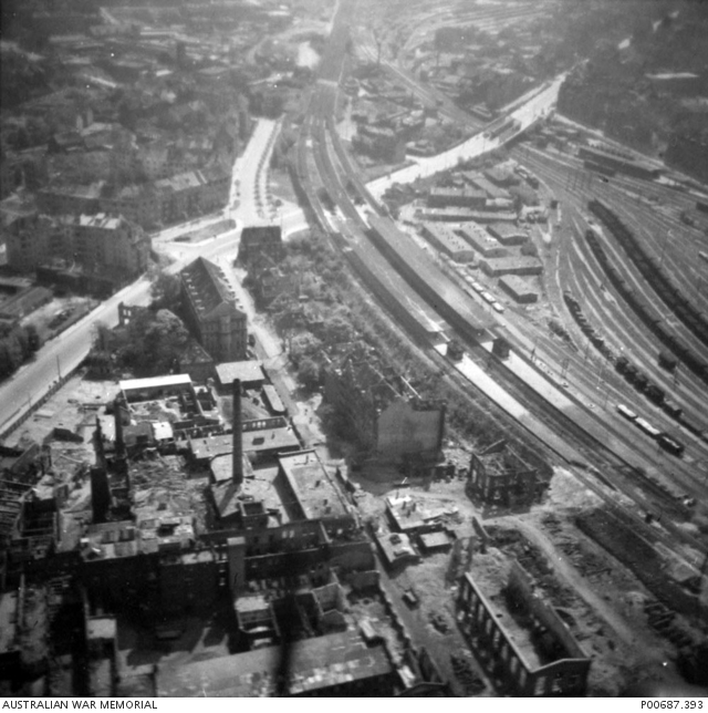 HANOVER, GERMANY, 1945-05-08. V.E. DAY; AERIAL VIEW OF TOWN AND RAIL ...