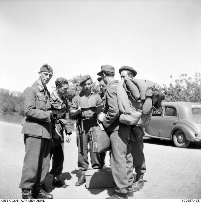 FLENSBURG, GERMANY, 1945-05. GERMAN SOLDIERS RETURNING HOME FROM ...
