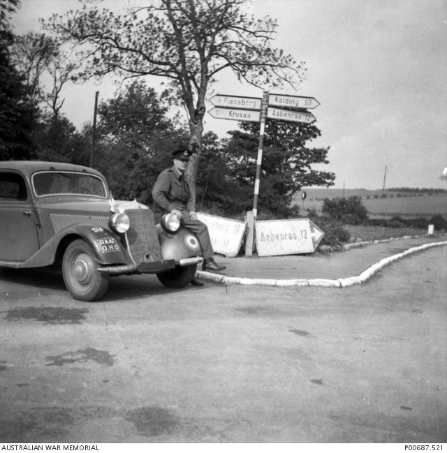 DENMARK, 1945-05. SELF BY MERCEDES MOTOR CAR AND SIGNPOSTS (134.5 ...