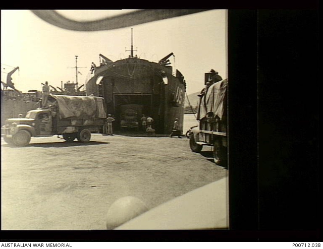 Italy, 1944-10. Two trucks belonging to No. 451 Squadron RAAF ...