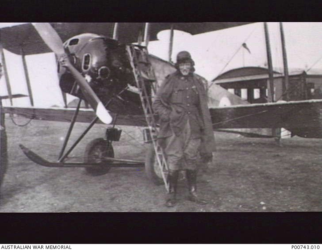 ENGLAND, C 1917. AN AUSTRALIAN FLYING CORPS (AFC) PILOT STANDING BY HIS ...
