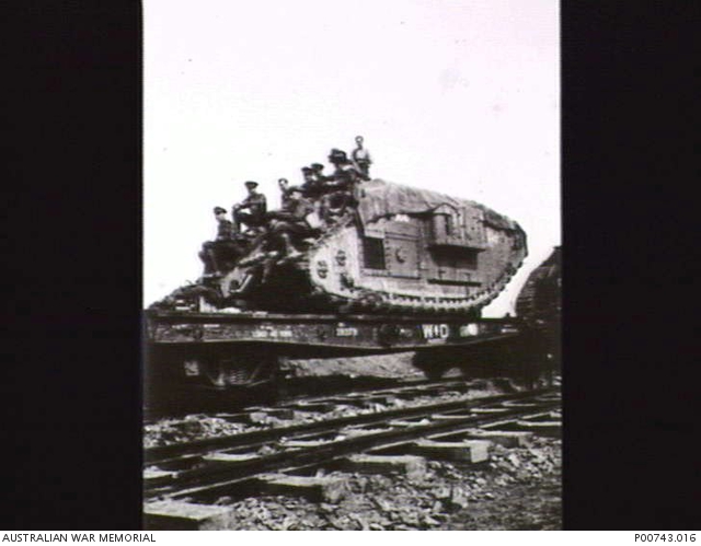 A British Mark V Female tank, loaded onto a War Department (WD) flat ...