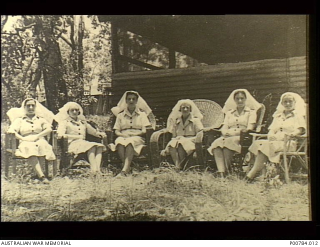 NT. c. 1944. Members of the RAAF Nursing Service relax in chairs ...