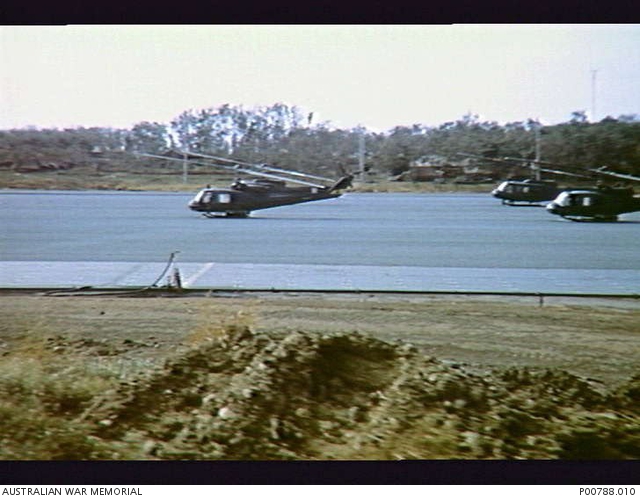 RAAF IROQUOIS HELICOPTERS SET UP AS GUNSHIPS AT LUSCOMBE FIELD, NUI DAT ...