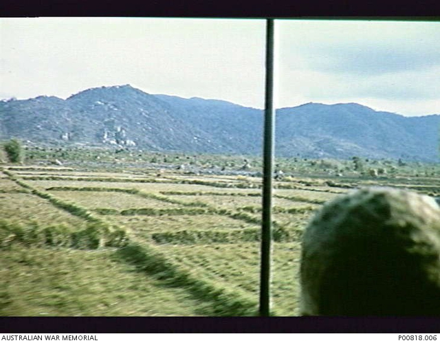 PHUOC TUY PROVINCE, VIETNAM, C. 1969-04. THE FOREGROUND SHOWS RICE ...