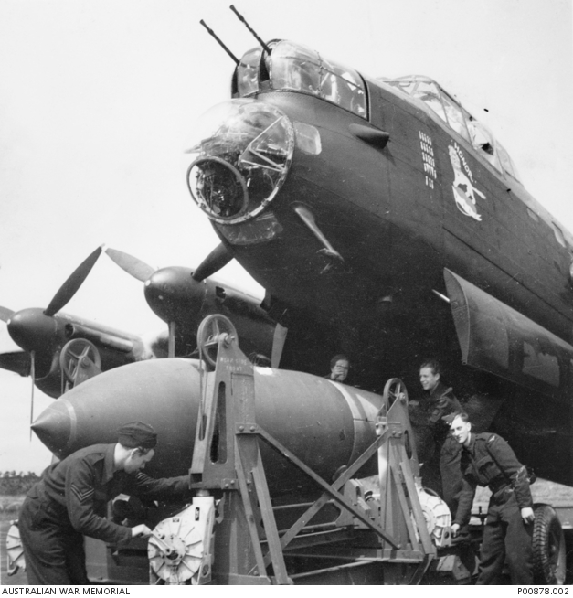 BINBROOK ?, ENGLAND. C.1945-06. MEMBERS OF 460 SQUADRON RAAF LOAD A ...