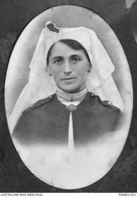 STUDIO PORTRAIT OF A MEMBER OF THE AUSTRALIAN ARMY NURSING SERVICE IN ...