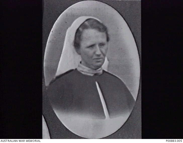 STUDIO PORTRAIT OF A MEMBER OF THE AUSTRALIAN ARMY NURSING SERVICE IN ...