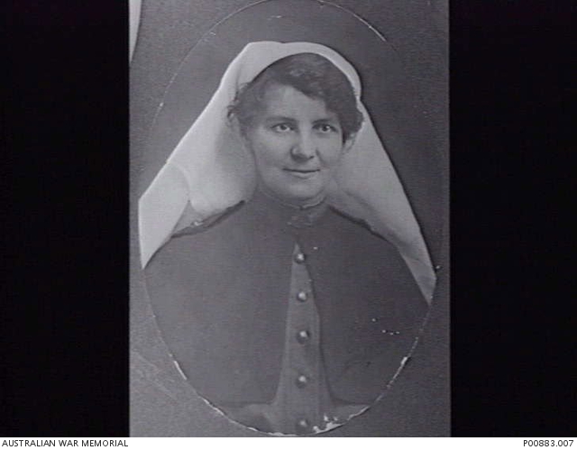 STUDIO PORTRAIT OF A MEMBER OF THE AUSTRALIAN ARMY NURSING SERVICE IN ...
