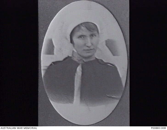 STUDIO PORTRAIT OF A MEMBER OF THE AUSTRALIAN ARMY NURSING SERVICE IN ...