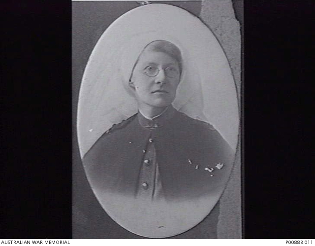 STUDIO PORTRAIT OF A MEMBER OF THE AUSTRALIAN ARMY NURSING SERVICE IN ...