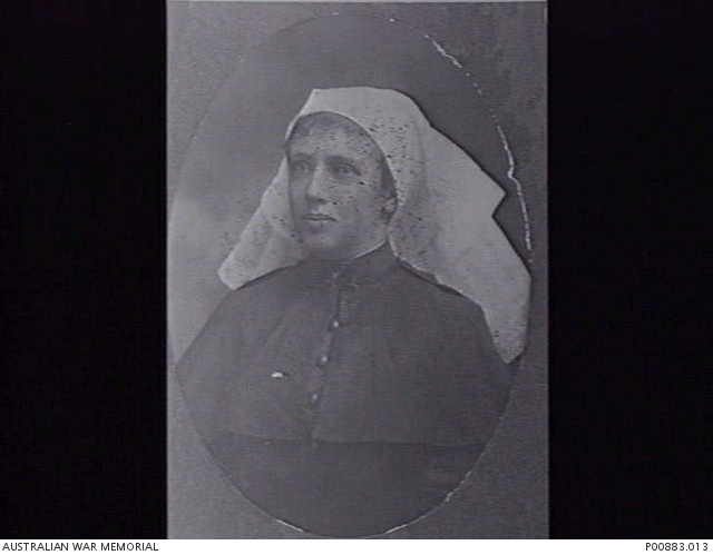 STUDIO PORTRAIT OF A MEMBER OF THE AUSTRALIAN ARMY NURSING SERVICE IN ...