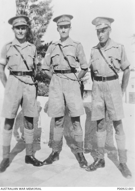 Probably Palestine, c. 1940. Formal outdoors portrait of three Military ...