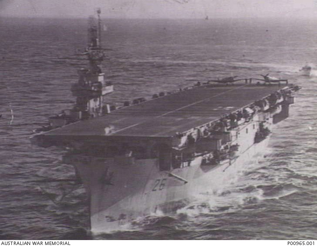 British escort aircrafr carrier HMS Slinger (26) at sea. Two ...