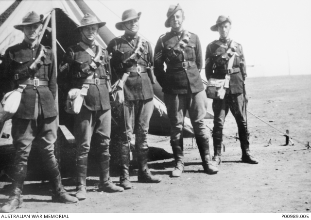 GROUP PORTRAIT OF FIVE MEMBERS OF THE 104TH BATTERY, 4TH FIELD ...