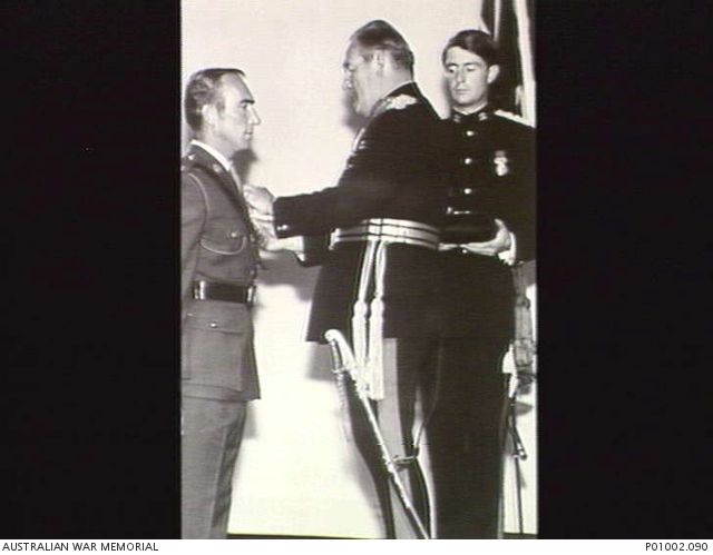MAJOR M.P. BLAKE BEING PRESENTED WITH THE MILITARY CROSS. MAJOR BLAKE ...