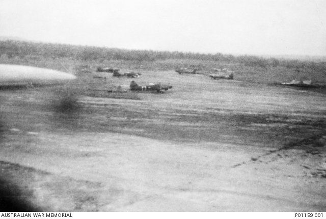 PENFOEI, TIMOR. 1943-02-28. JAPANESE AIRCRAFT ON THE AIRFIELD DURING AN ...