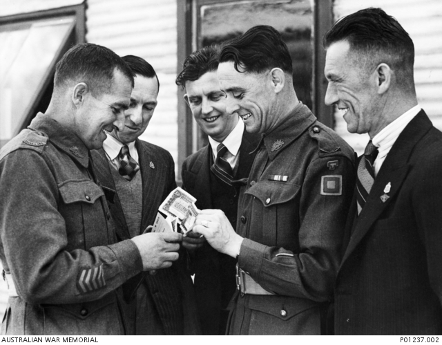 Informal group portrait showing, from left to right, brothers Private ...