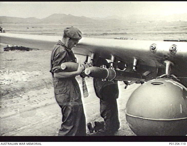 IWAKUNI, JAPAN. 1950-07. ARMAMENT PERSONNEL LOADING 5 INCH HIGH ...