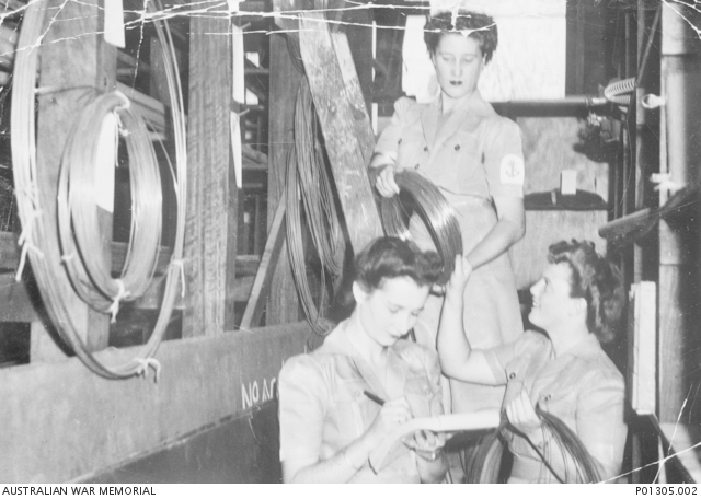Informal portrait of three members of the Women’s Royal Australian ...