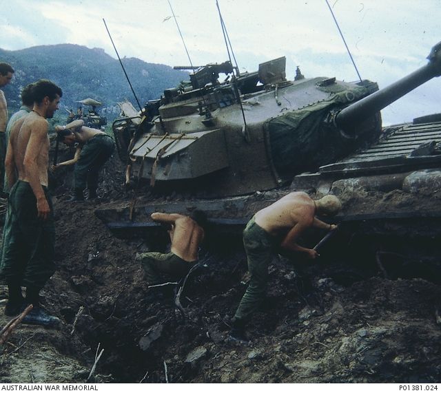 Australian soldiers digging out a Centurion MkV/1 tank of B Squadron ...