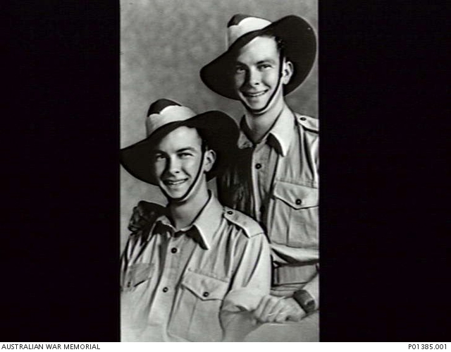 BRISBANE, QLD. 1943. STUDIO PORTRAIT OF TWIN BROTHERS ROLAND (LEFT) AND ...