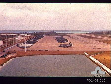 AN AERIAL PHOTOGRAPH, TAKEN FROM A HELICOPTER OFF HMAS ADELAIDE, OF THE ...