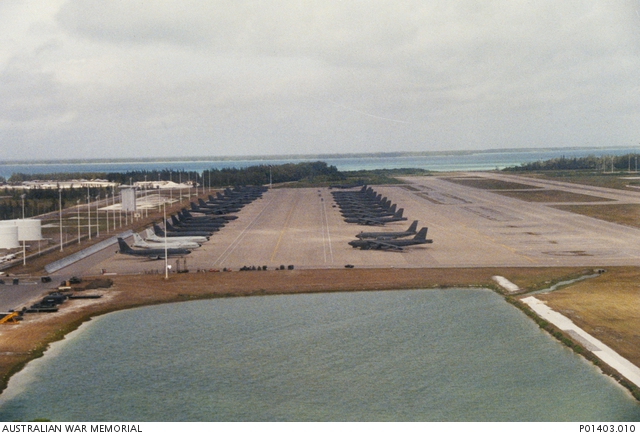 AN AERIAL PHOTOGRAPH, TAKEN FROM A HELICOPTER OFF HMAS ADELAIDE, OF THE ...