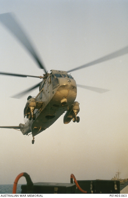 UNITED STATES NAVY SH-3H SEAKING HELICOPTER NO 613 APPROACHING THE ...
