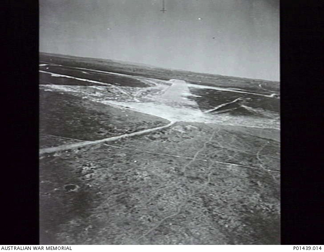 PENFUI, DUTCH TIMOR, 1945-09-16. AERIAL VIEW OF THE AIRSTRIP SUBJECTED ...