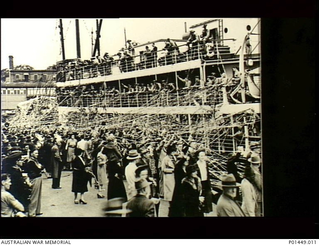 Sydney, NSW. 1939-03-15. Members of Darwin Mobile Force line the rails ...