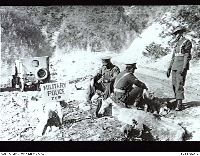 KOREA. 1951. TRAFFIC CONTROL POST WITH TWO BRITISH MILITARY POLICEMEN ...
