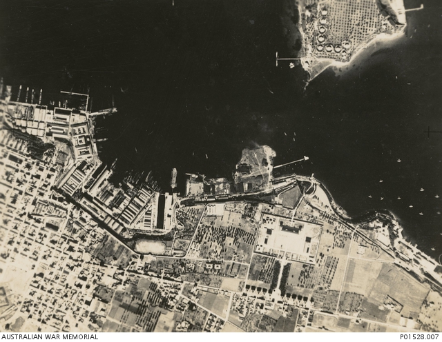TARANTO, ITALY. 1940-11. AERIAL VIEW SHOWING AFTERMATH OF ACTION ...