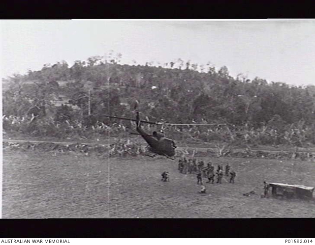 A No 9 Squadron, RAAF, Iroquois UH-1B helicopter prepares to land at ...
